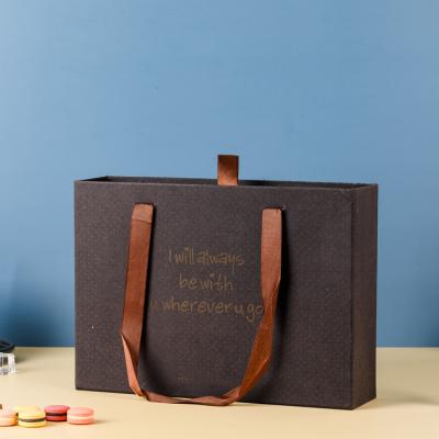 China Black Paper Gift Box with Bag Customized Logo and Cardboard Material for sale