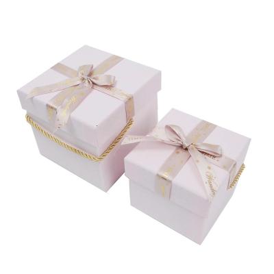 China Custom Logo Card Small Favors Red White Jewelry Gift Box with Ribbon Bow and Handle for sale