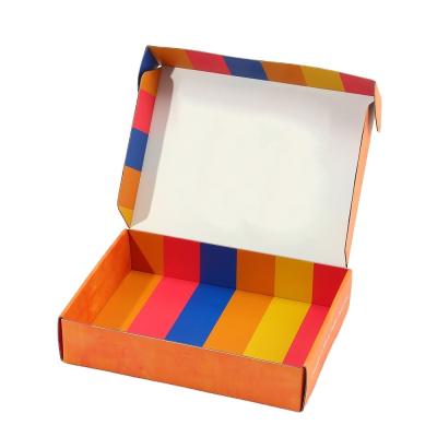 China Custom Size Accepted Folding Corrugated Carton Clothes Packaging Paper Box with Design for sale