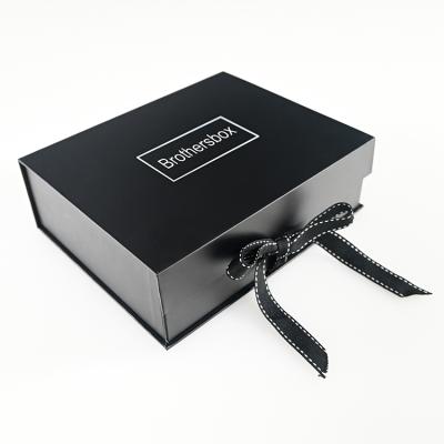 China Personalized custom full color printing foldable flip box with ribbon folding packaging box for sale
