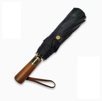 China 10 Bone Windproof Wood Handle Three Fold Umbrella for Adults Automatic Double Umbrella for sale