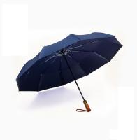 China 10 Bone Windproof Wood Handle Three Fold Umbrella for Adults Automatic Double Umbrella for sale