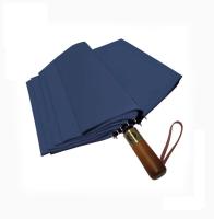 China 10 Bone Windproof Wood Handle Three Fold Umbrella for Adults Automatic Double Umbrella for sale