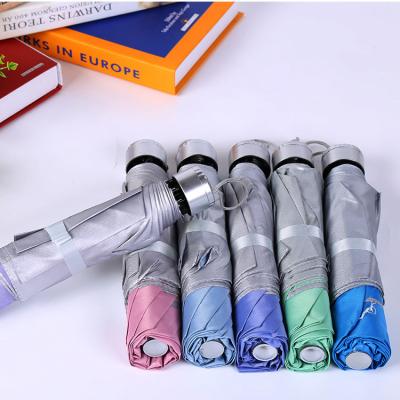 China Custom Logo Print 7K 3 Folding Umbrella with Plastic Handle and 94cm Open Diameter for sale