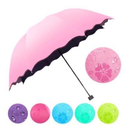 China Minimalist Design Style Magic UV Folding Sun Rain Windproof Flowering Umbrella for sale