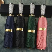 China Manual Control Diamond Insert Handle 3 Fold Umbrella Unique Rain Umbrellas for Women for sale