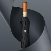China Carom Cloth Fabric Material Travel Umbrella with Wooden Handle 12 Rib Windproof Design for sale