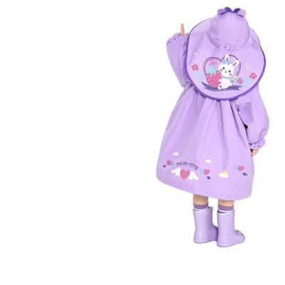 China Children's Raincoat with Cute Cape-style Schoolbag Design at Treasure Kindergarten for sale