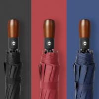 China Fiberglass Ribs 23inch 12K 210T Pongee Auto Umbrella with UV Blackcoated Wooden Handle for sale