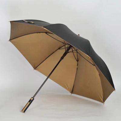 China Custom Golden Coated Fabric Umbrellas with Semi-Automatic Control and Golden Handle for sale