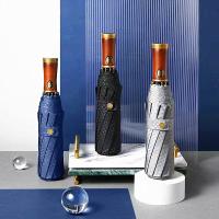 China Automatic Folding Men's Wooden Handle Umbrella with Solid Wood Shaft and Retro Design for sale