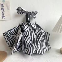 China Knock warm yellow Zebra umbrella women's sun and rain dual- sunscreen vinyl daily products for sale
