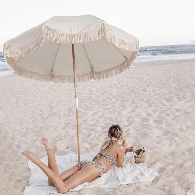 China Outdoor Patio Beach Umbrella with Tassel Sunshade and 29/32 Shaft Korean Style Large for sale