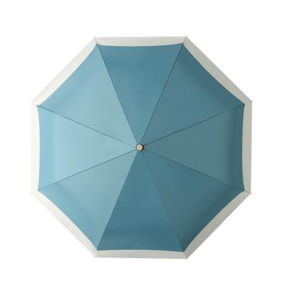 China Rubber Coated Handle Gift Triple Fold Umbrella with Customized Designs Logo Printing for sale