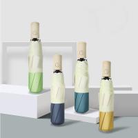China Rubber Coated Handle Gift Triple Fold Umbrella with Customized Designs Logo Printing for sale