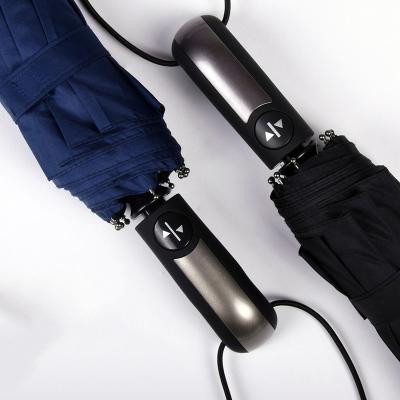 China Rubber Handle Dual Waterproof Umbrella with Minimalist Design and Custom Logo Printing for sale