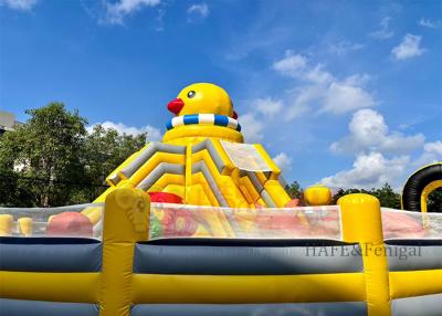 China Large Outdoor Inflatable Yellow Duck Amusement Castle Bouncing Game Castle for sale