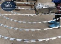 China Electro Galvanized Flat Wrap Razor Wire Razor Blade Fencing Export To Malaysia for sale