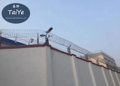 China Prison Concertina Galvanized Razor Barbed Tape Wire High Quality for sale