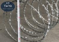 China Heavy Galvanized Razor Blade Fencing Coil Diameter 450mm Military Razor Barbed Tape for sale