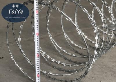 China Heavy Galvanized Razor Blade Fencing Coil Diameter 450mm Military Razor Barbed Tape for sale