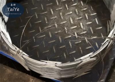 China Iron Wire Material CBT 65 Razor Wire Hot Dipped Galvanized Steel Razor Sharp Wire for sale