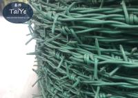 China PE PVC Coated Security Barbed Wire Stoving Varnish Razor Coil Barbed Wire for sale