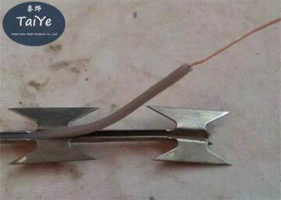 China Stable Alarm Razor Barbed Wire Fence 2A Electricity Anti Blocking for sale