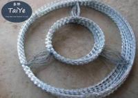 China Double Cross  Concertina Razor Barbed Wire Coils 1600 MPa High Tensile for sale