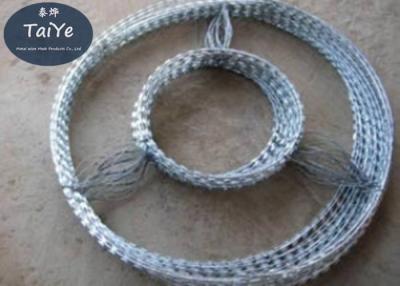 China Double Cross  Concertina Razor Barbed Wire Coils 1600 MPa High Tensile for sale