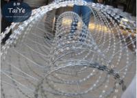 China Double Cross  Concertina Razor Barbed Wire Coils 1600 MPa High Tensile for sale