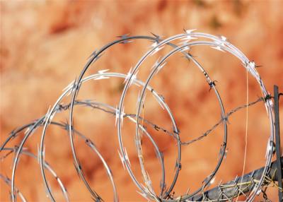 China Durable Concertina Cbt 65 Razor Wire Concertina Coils Hot Dipped Galvanized for sale