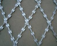 China Razor Blade Barbed Fence Security Wire Single Loop Coiled Galvanized / Pvc Coated for sale