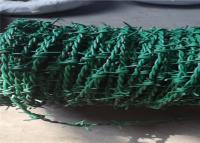 China PVC Coated Lowa Barbed Wire Green Security Fence On Chain Link Fence Top for sale