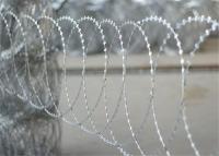 China Hot Dip Galvanized BTO 10 Flat Razor Wire Stainless Steel On Protect Private Grounds for sale