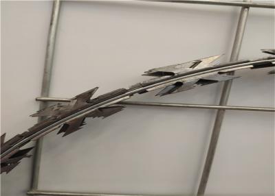 China 10kg / Coil CBT - 60 Hot Dipped Galvanized Razor Wire With Coil Diameter 30cm for sale