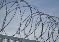 China Barbed Tape Razor Wire Made in Coils concertina line for Security Barrier Fencing for sale