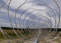 China Barbed Tape Razor Wire Made in Coils concertina line for Security Barrier Fencing for sale
