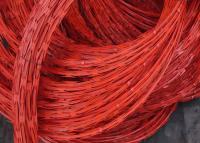 China PVC Coated Concertina Razor Wire CBT -65 Razor Ribbon Fencing 5-25kg Weight for sale