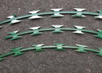 China Concertina Colour Razor Ribbon Pvc Coated Barbed Wire For Housetop for sale