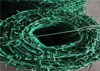 China PVC Coated PE Coated Security Barbed Wire , Barbed Wire Wall Price Per Roll for sale