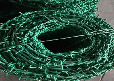 China PVC Coated PE Coated Security Barbed Wire , Barbed Wire Wall Price Per Roll for sale