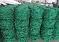China PVC Coated PE Coated Security Barbed Wire , Barbed Wire Wall Price Per Roll for sale