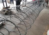 China Coiled Double Concertina Razor Wire Barbed Tape With Beautiful Appearance for sale
