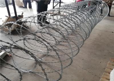 China Coiled Double Concertina Razor Wire Barbed Tape With Beautiful Appearance for sale