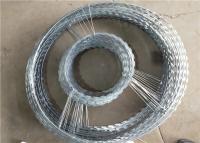 China Coiled Double Concertina Razor Wire Barbed Tape With Beautiful Appearance for sale