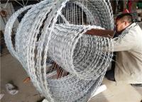 China Security Conductor Razor Coil Electric Spiral Barbed Wire For Isolation Protection for sale