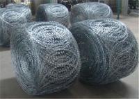 China Iso BTO -22 Razor Wire Flat Wrap Coils Are Made Of High Tensile Razor Wire for sale