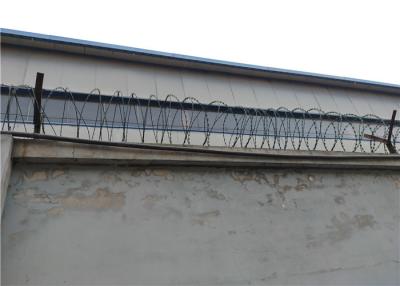 China Concertina Razor Tape Wire BTO 22 Razor Wire Use On Top Of Wall for sale