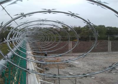 China Cbt -60 Concertina Razor Barbed Tape Wire On Chain Link Fence Razor Fence for sale
